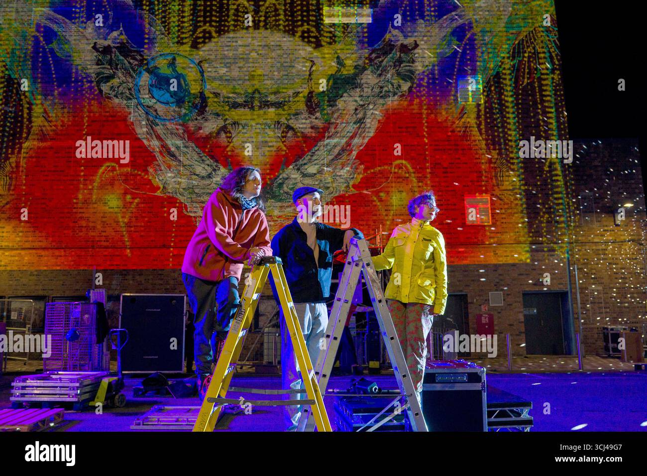 Artists (left-right) Alba Corral, Cathie Boyd and Will Potts prepare ...