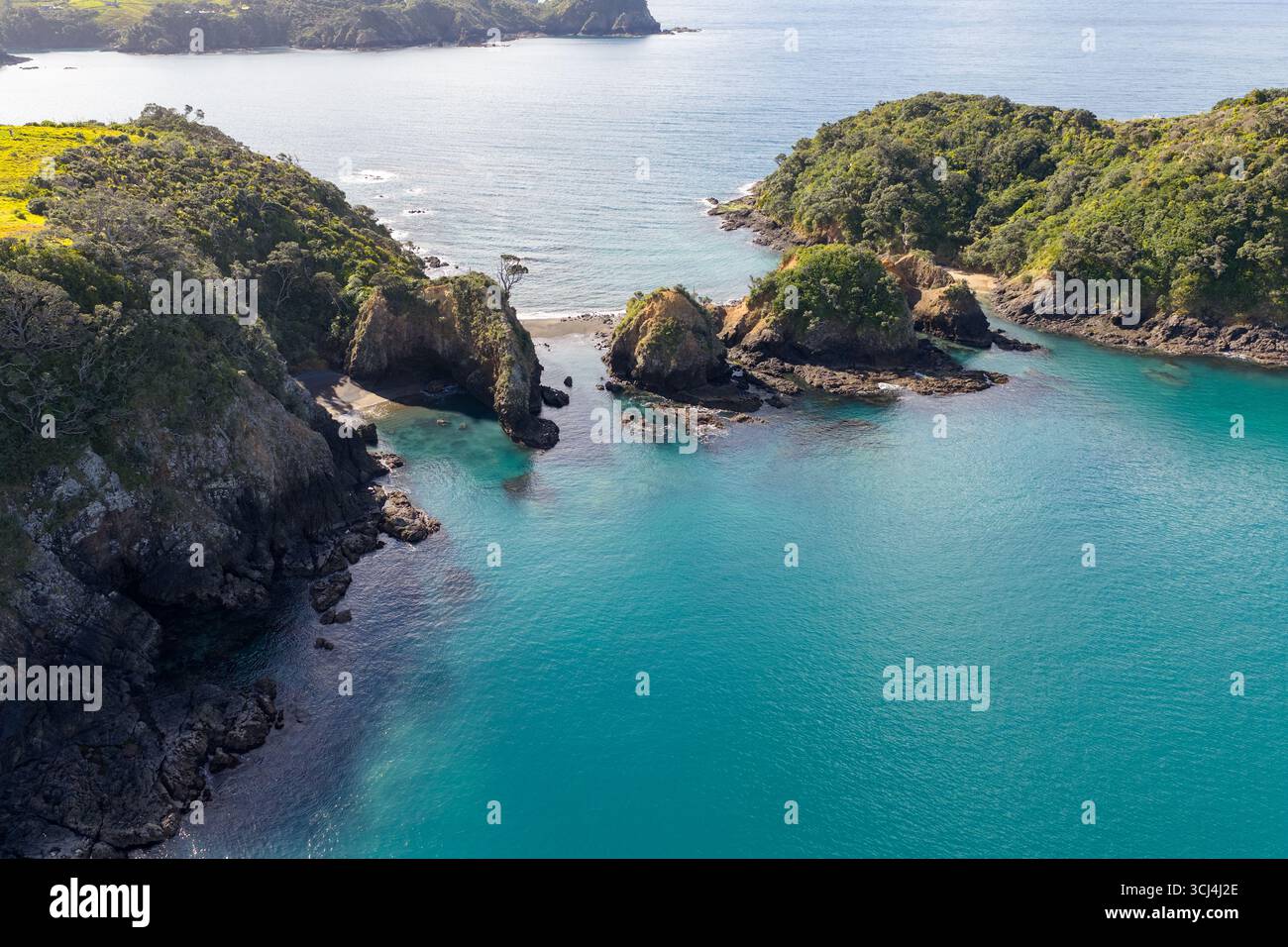 Aerial view of the rugged coastline where verdant headlands meet the ...