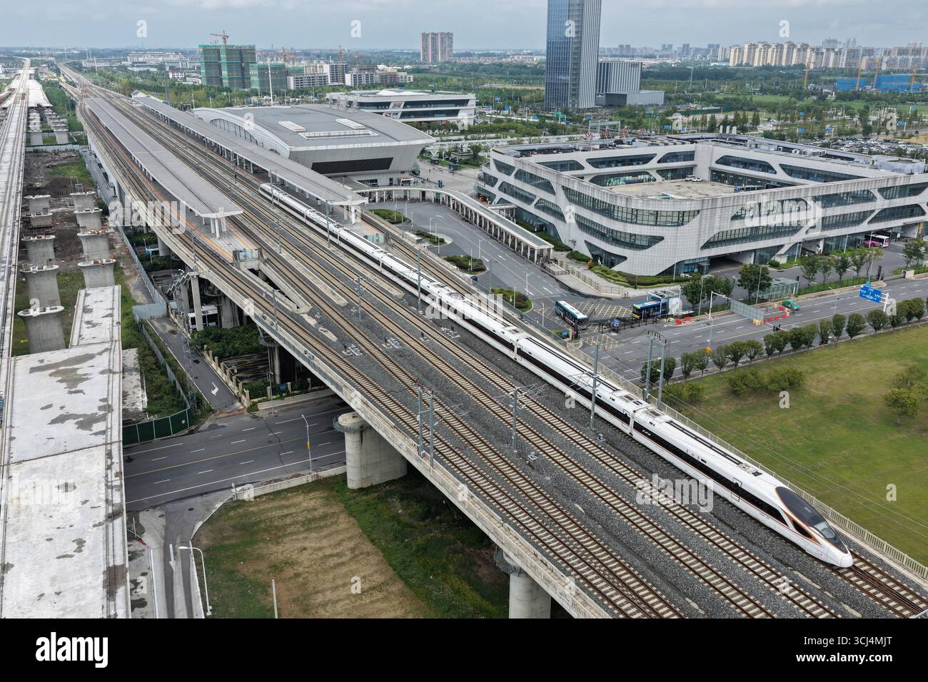 Passengers are seen at Yangzhoudong railway station in Yangzhou City ...