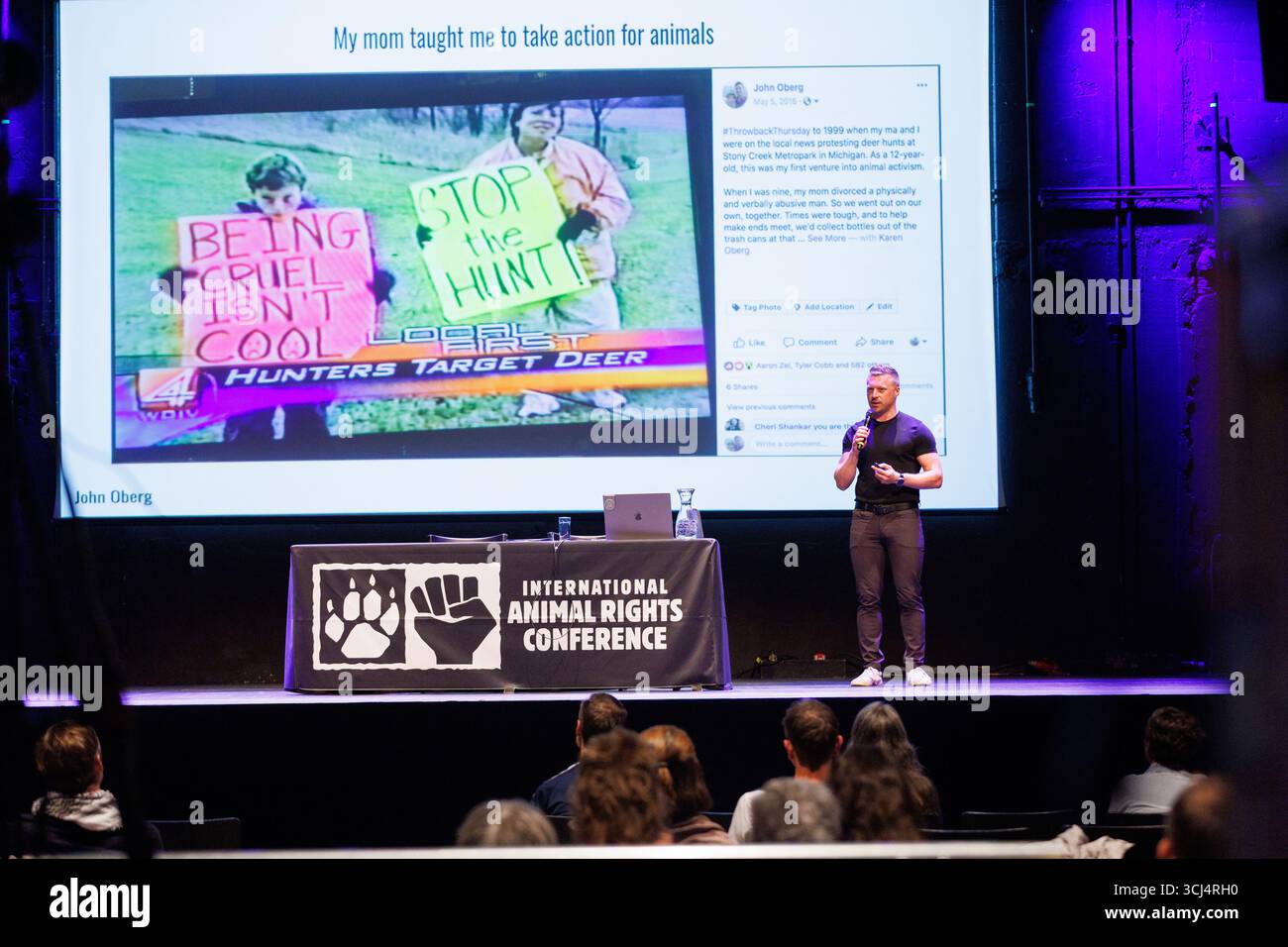 John Oberg delivers a presentation during the International Animal ...