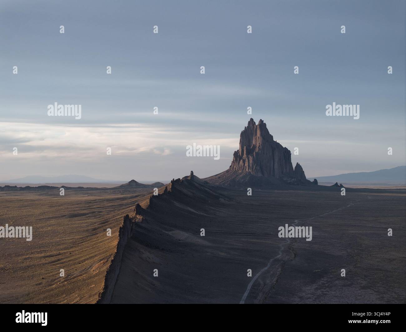 Aerial view of the iconic Shiprock peak rising dramatically from the ...