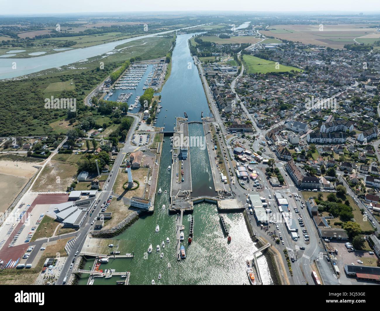 Aerial view of the Caen canal cutting through the landscape, where the ...