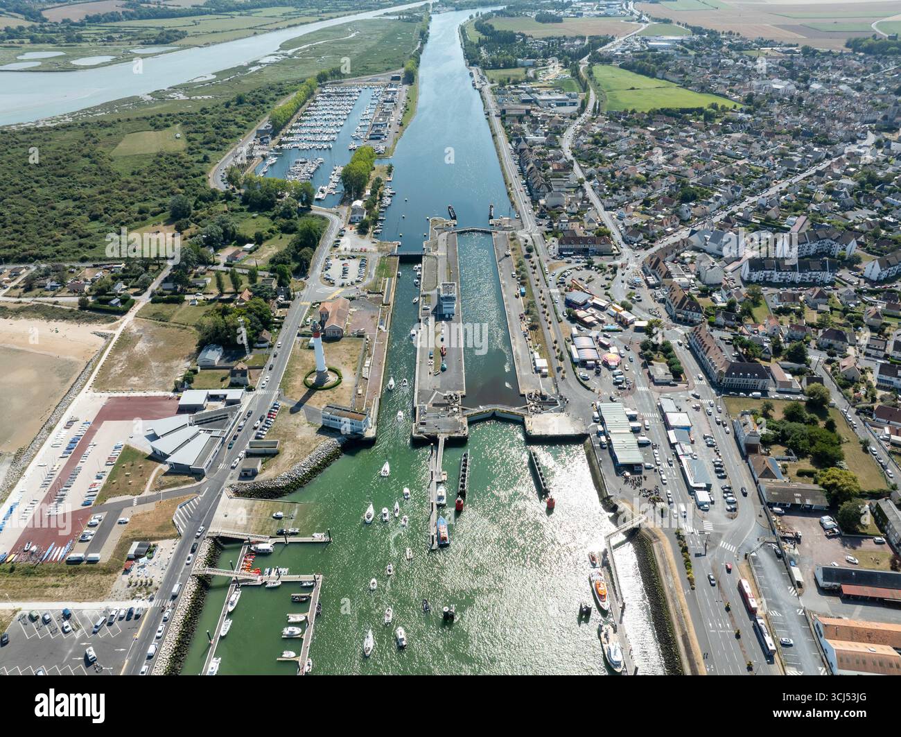 Aerial view of the Caen Canal cutting through the landscape, meeting ...