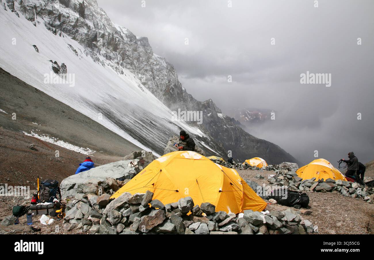 Mountaineers doing various camp chores at 16200 camp on Aconcagua ...
