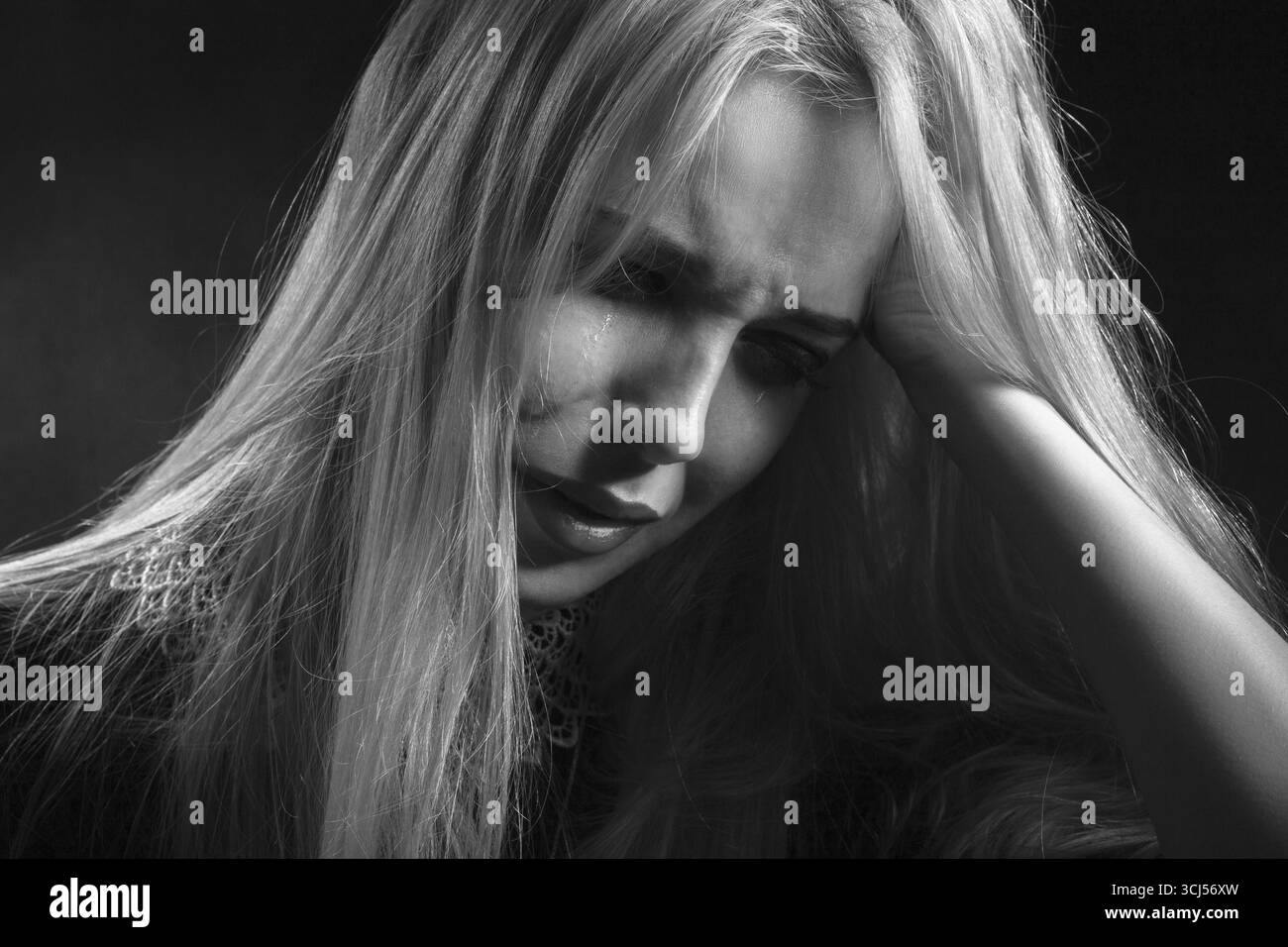 Sad crying woman on Black and White Stock Photos & Images - Alamy