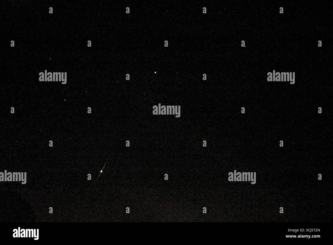 arade of planets in the night sky. Kiss of Venus and Jupiter Stock ...