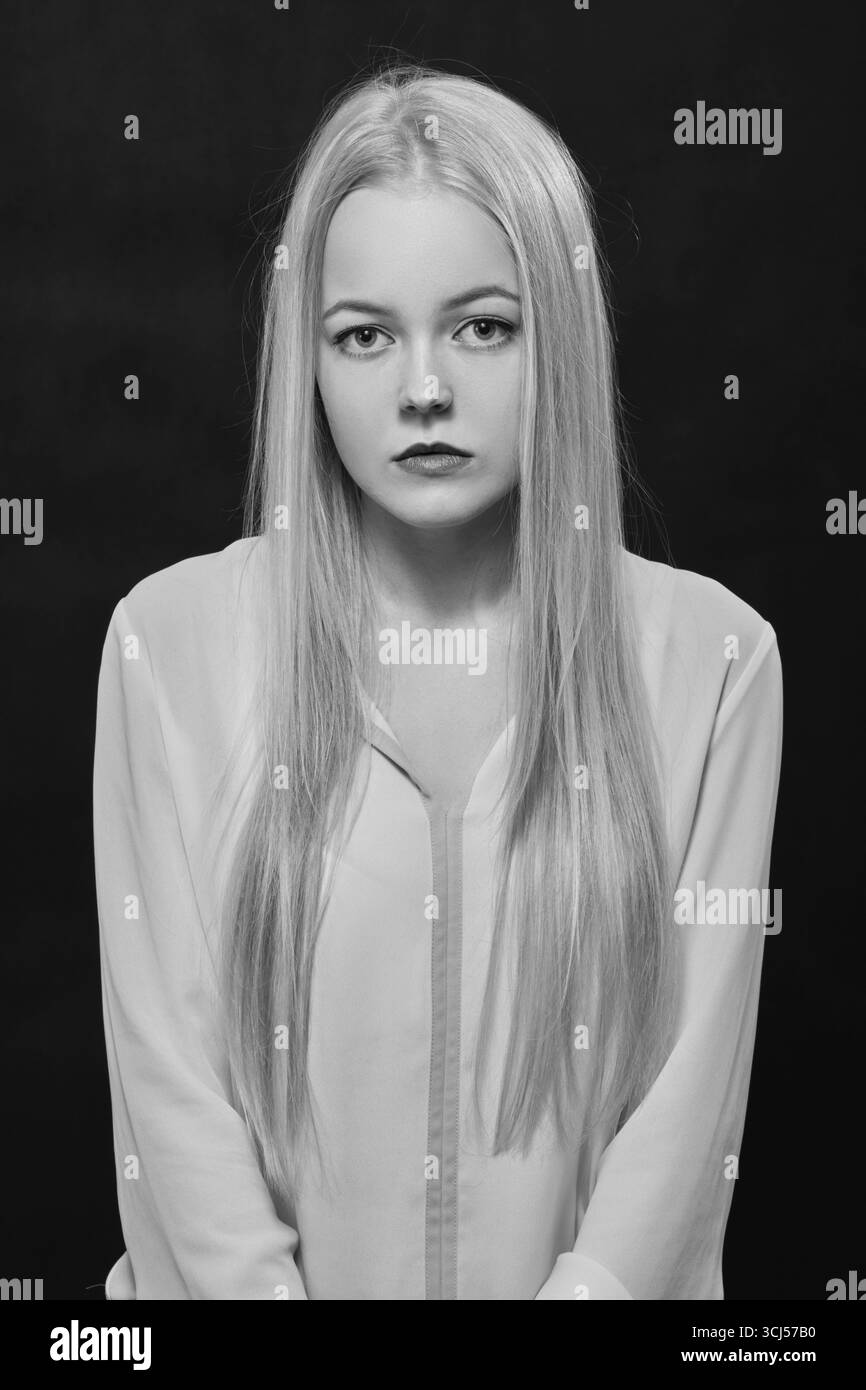 Disappointed young female on Black and White Stock Photos & Images - Alamy