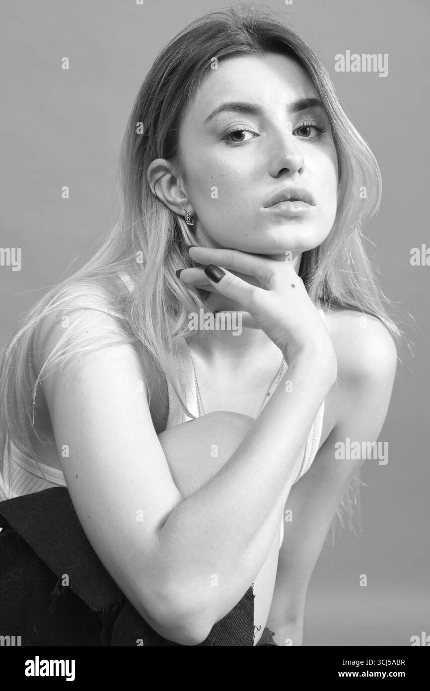Disappointed young serious woman Black and White Stock Photos & Images ...