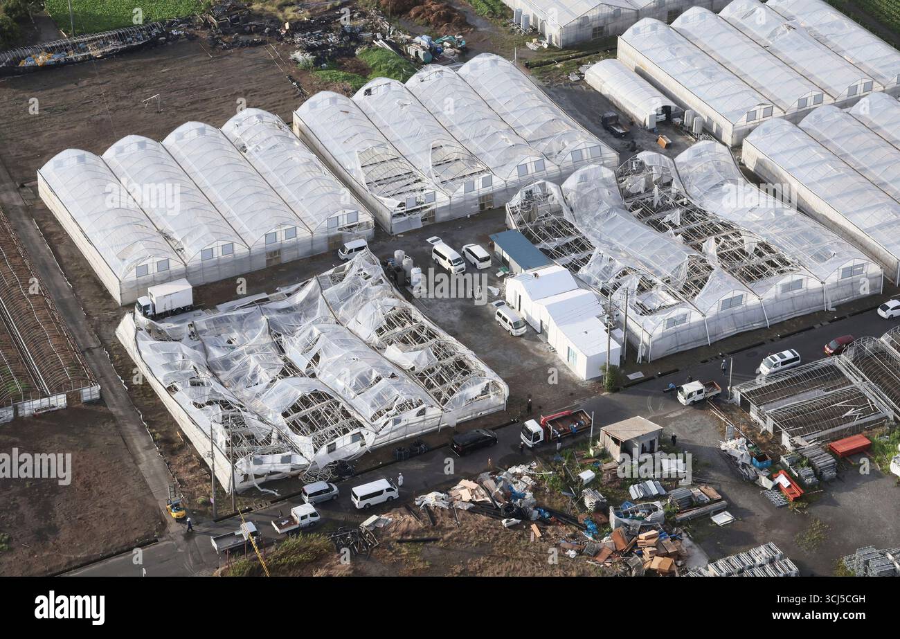 An aerial photo shows vinyl houses damaged by a sudden gust of wind ...