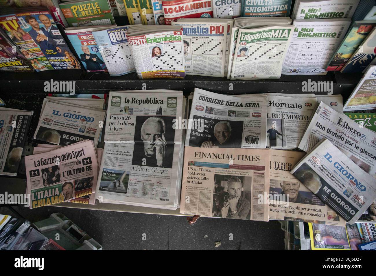 Milan, Italian newsstands display national and international newspapers ...