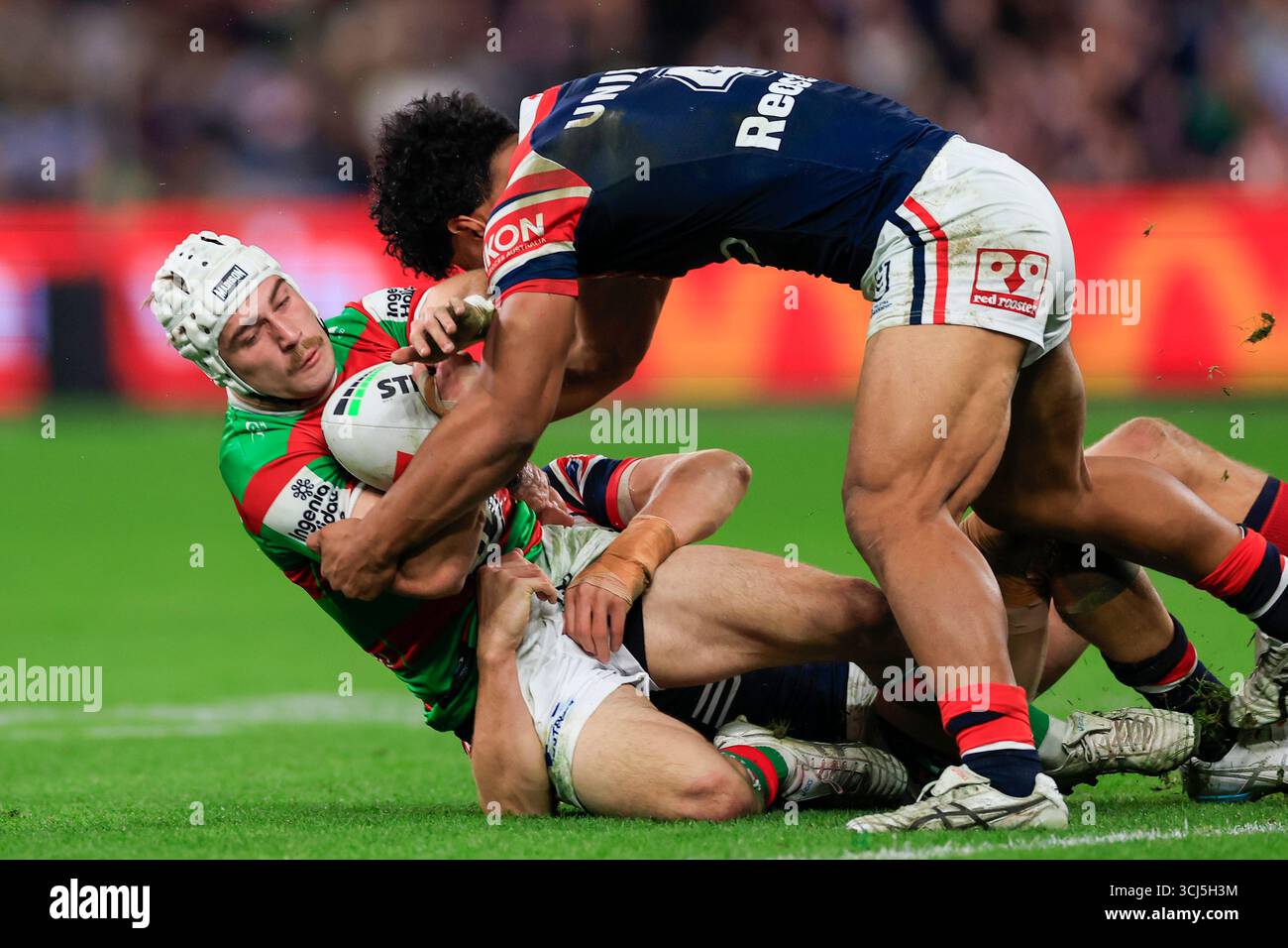 Jye Gray of the Rabbitohs is tackled during the NRL Round 27 match ...