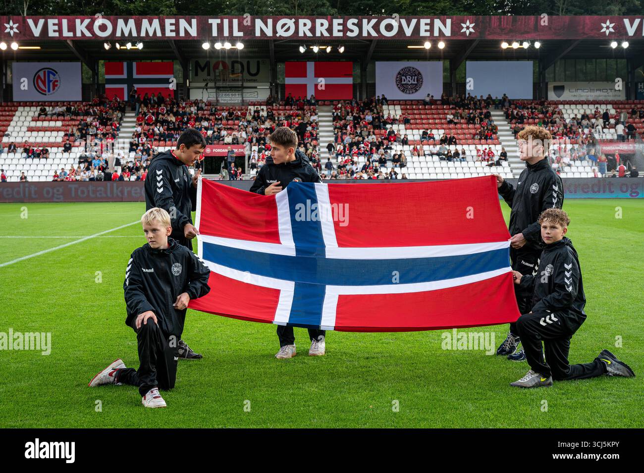 Vejle, Denmark. 04th, September 2025. Match mascots seen with the flag ...