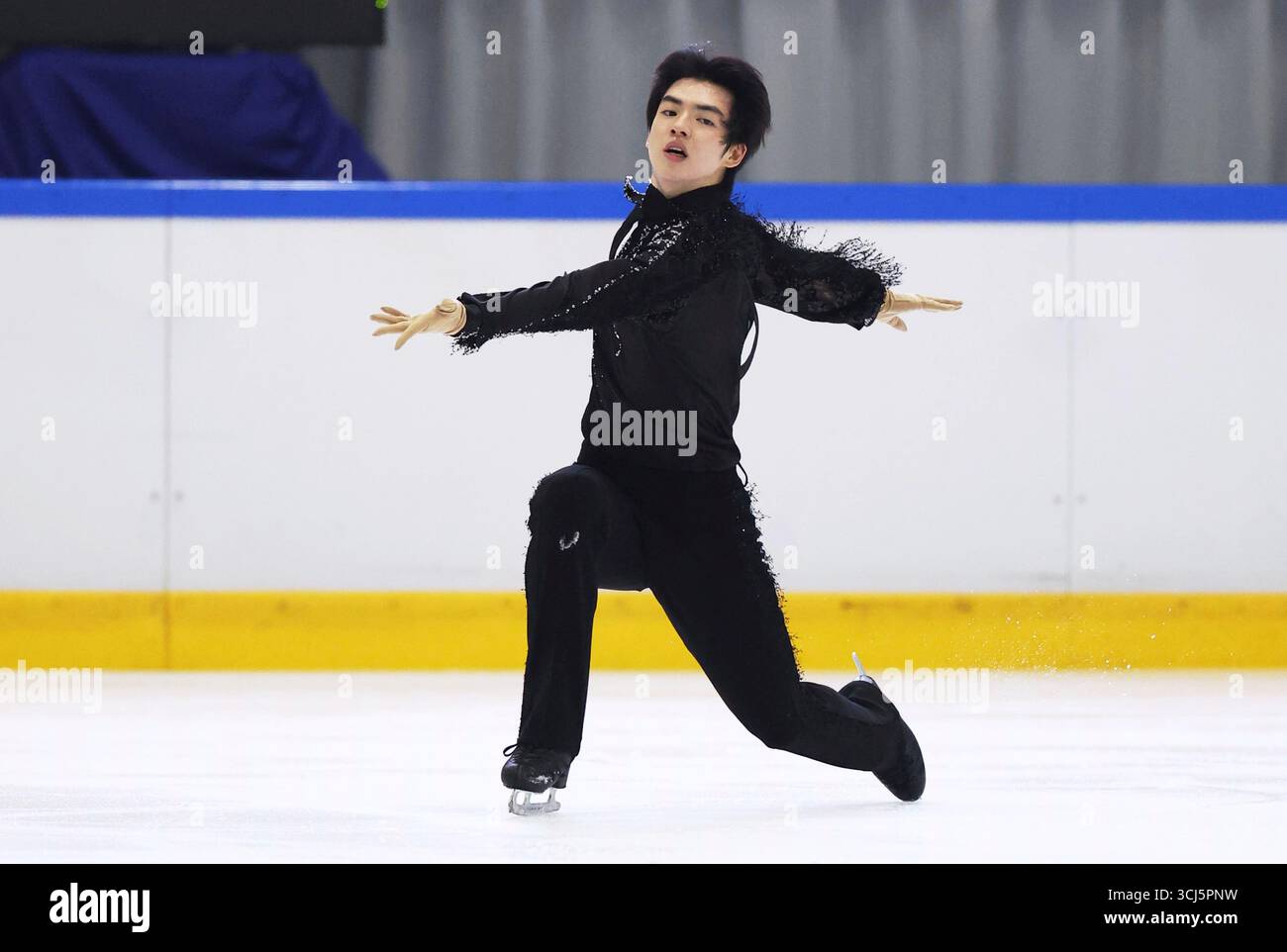 Junhwan CHA of South Korea performs during the men's short program of the Kinoshita Group Cup at ...