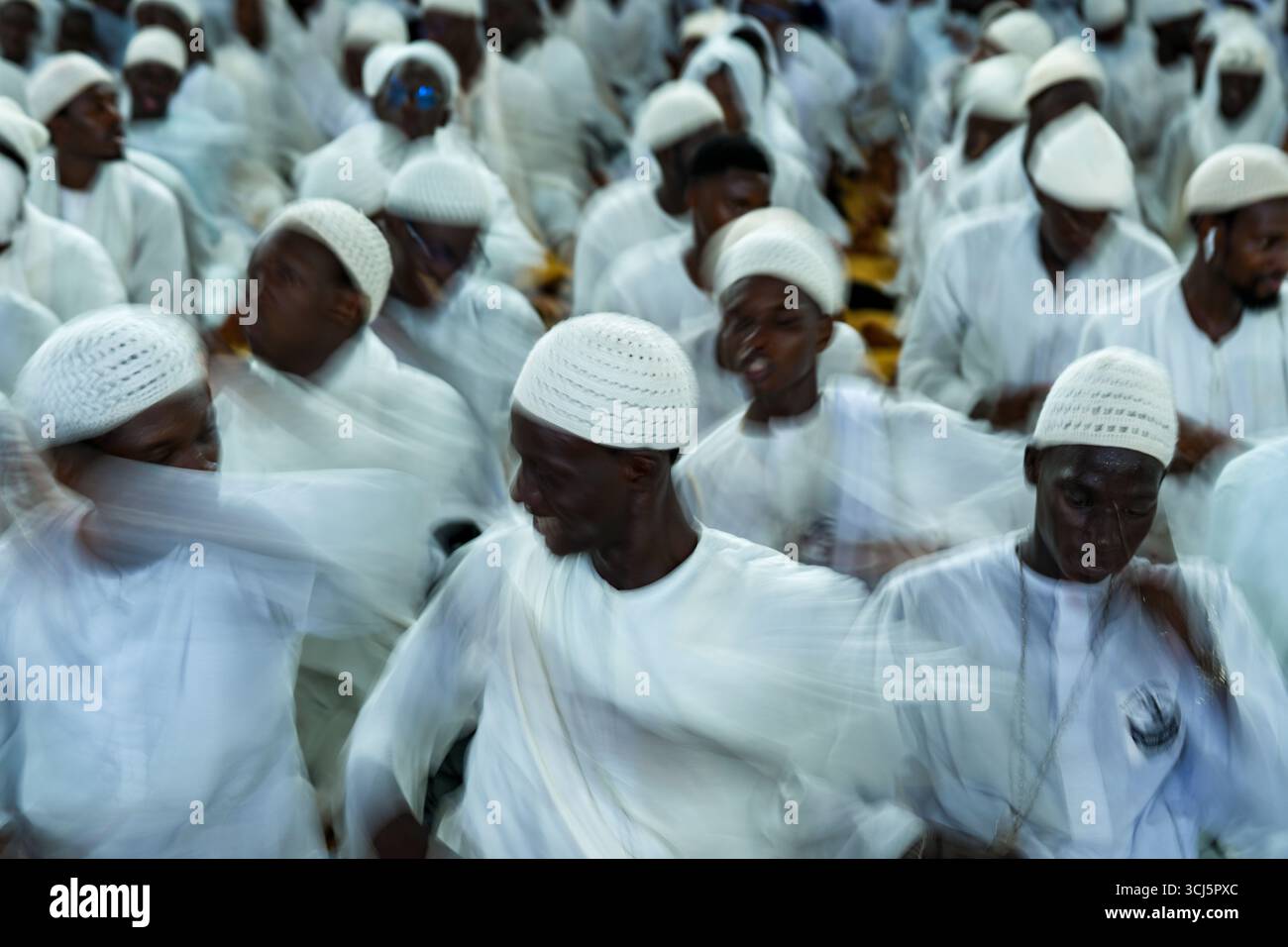 Men sing and gesture as they mark Prophet Muhammad's birthday, known as ...