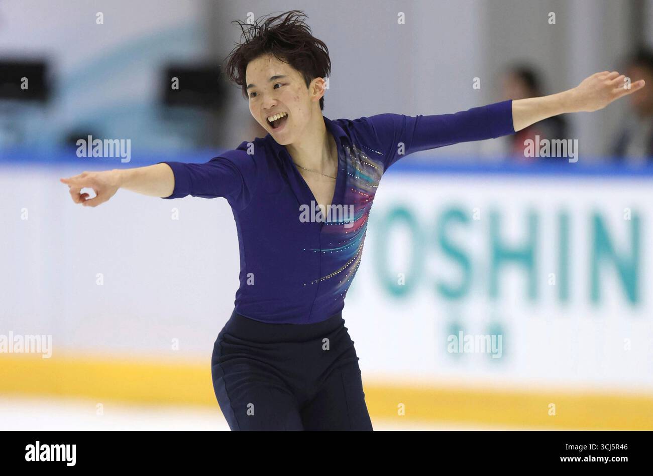 Kazuki TOMONO of Japan performs during the men's short program of the ...