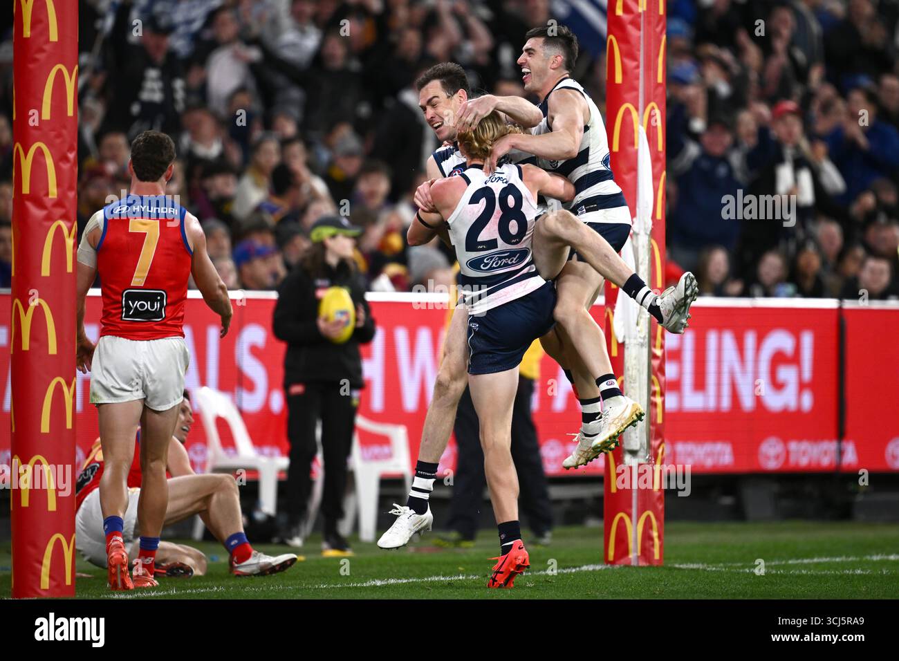 Oliver Dempsey of Geelong celebrates scoring a goal during the AFL ...
