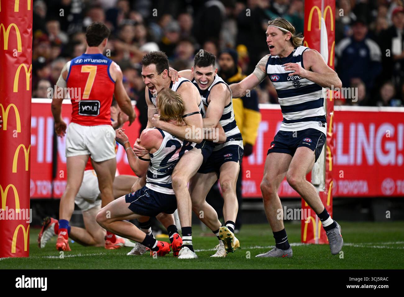 Oliver Dempsey of Geelong celebrates scoring a goal during the AFL ...