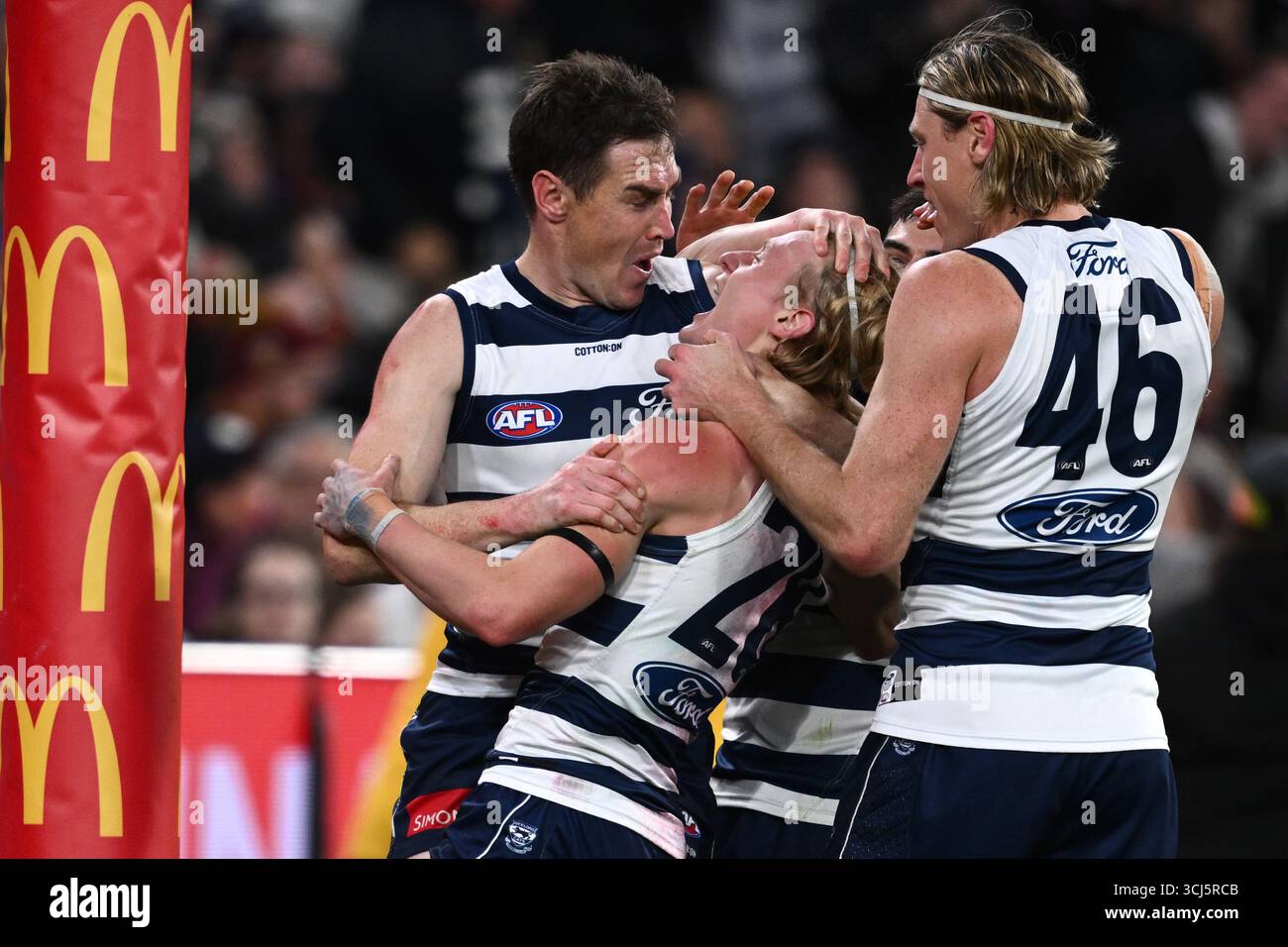 Oliver Dempsey of Geelong celebrates scoring a goal during the AFL ...