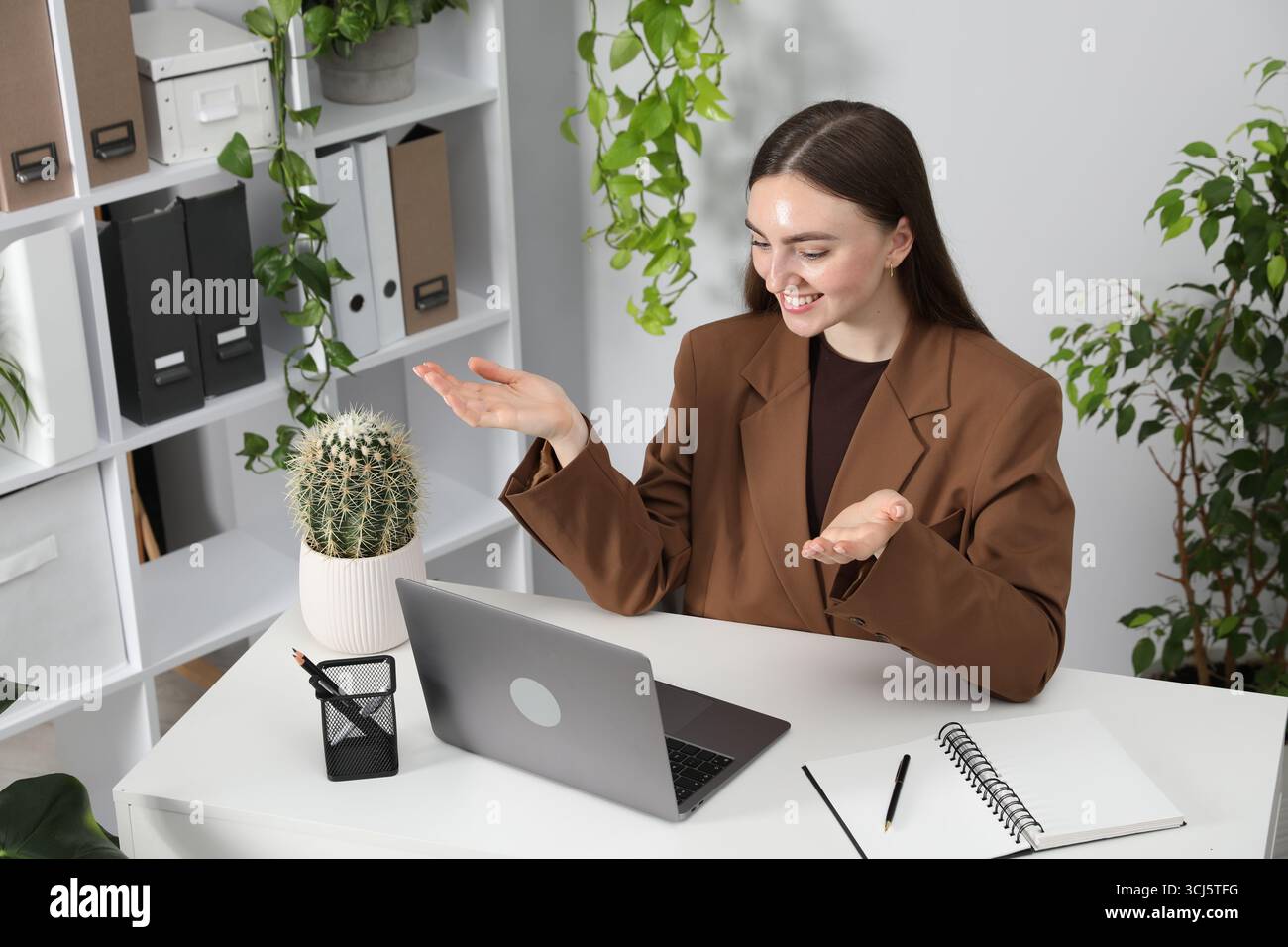 Woman having video call green hi-res stock photography and images - Alamy