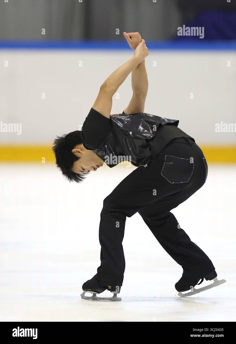 Tomoki HIWATASHI of United States performs during the men's short ...
