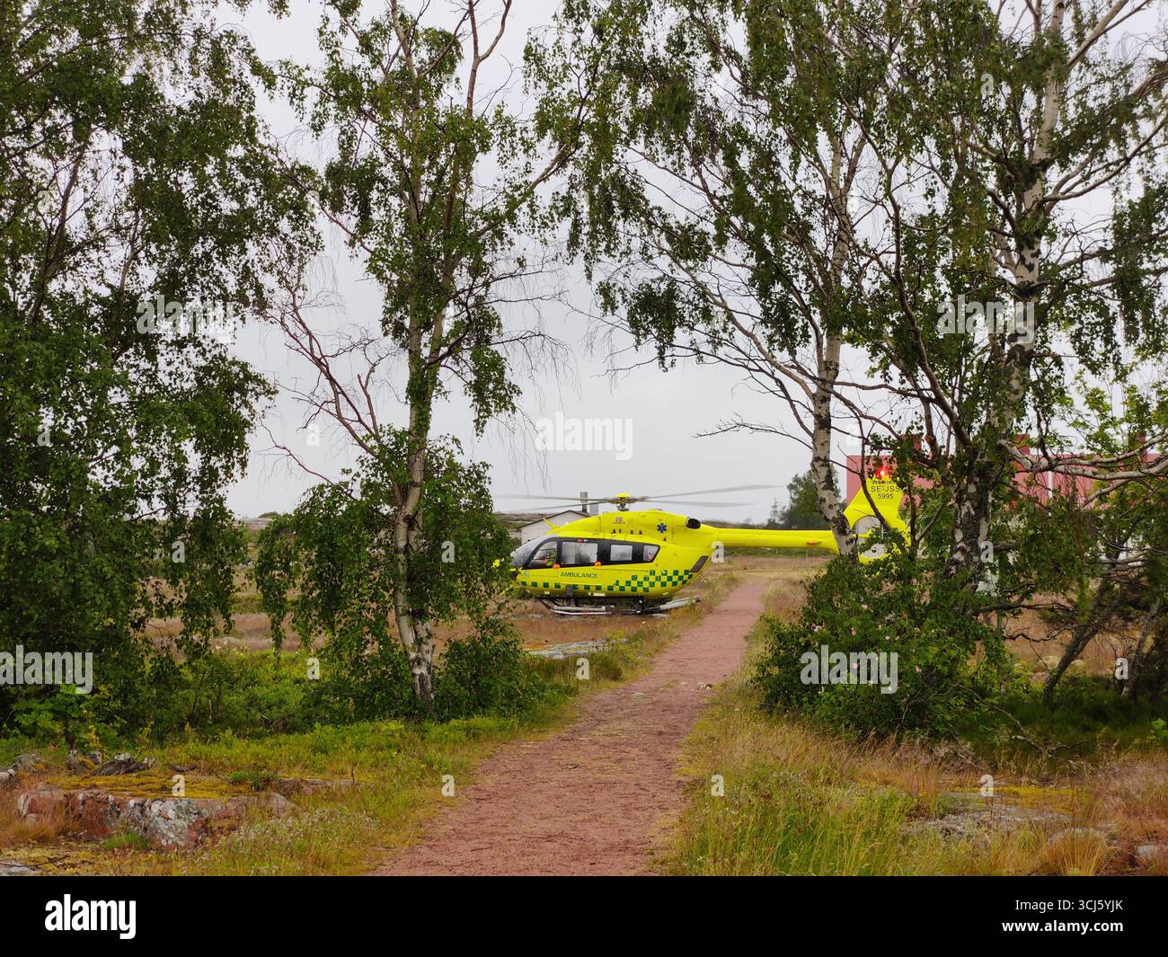 A rescue helicopter evacuates an injured person from a Finnish island ...