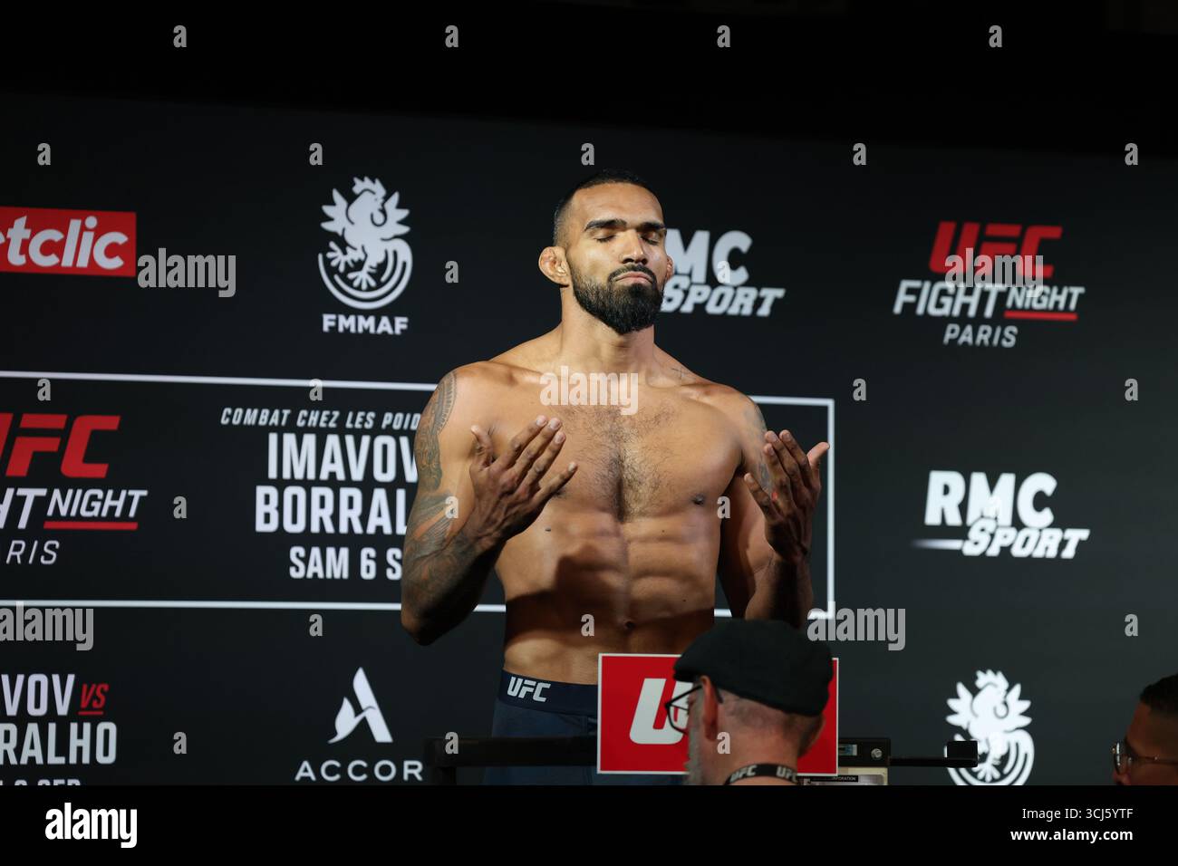 PARIS, PARIS - SEPTEMBER 05: Brendson Ribeiro poses on the scale during ...