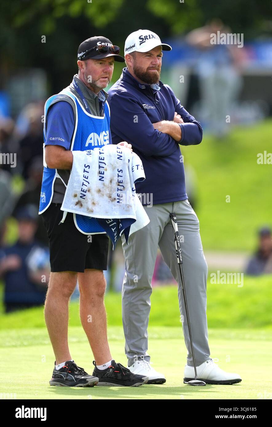 Ireland's Shane Lowry (right) and caddie Darren Reynolds on the 1st ...