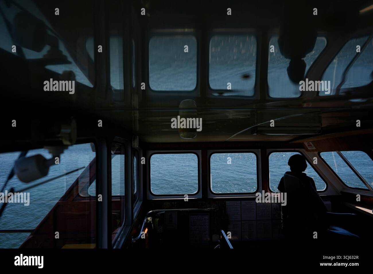 Expedition 501 member Verena Heuer looks out from the bridge of the ...