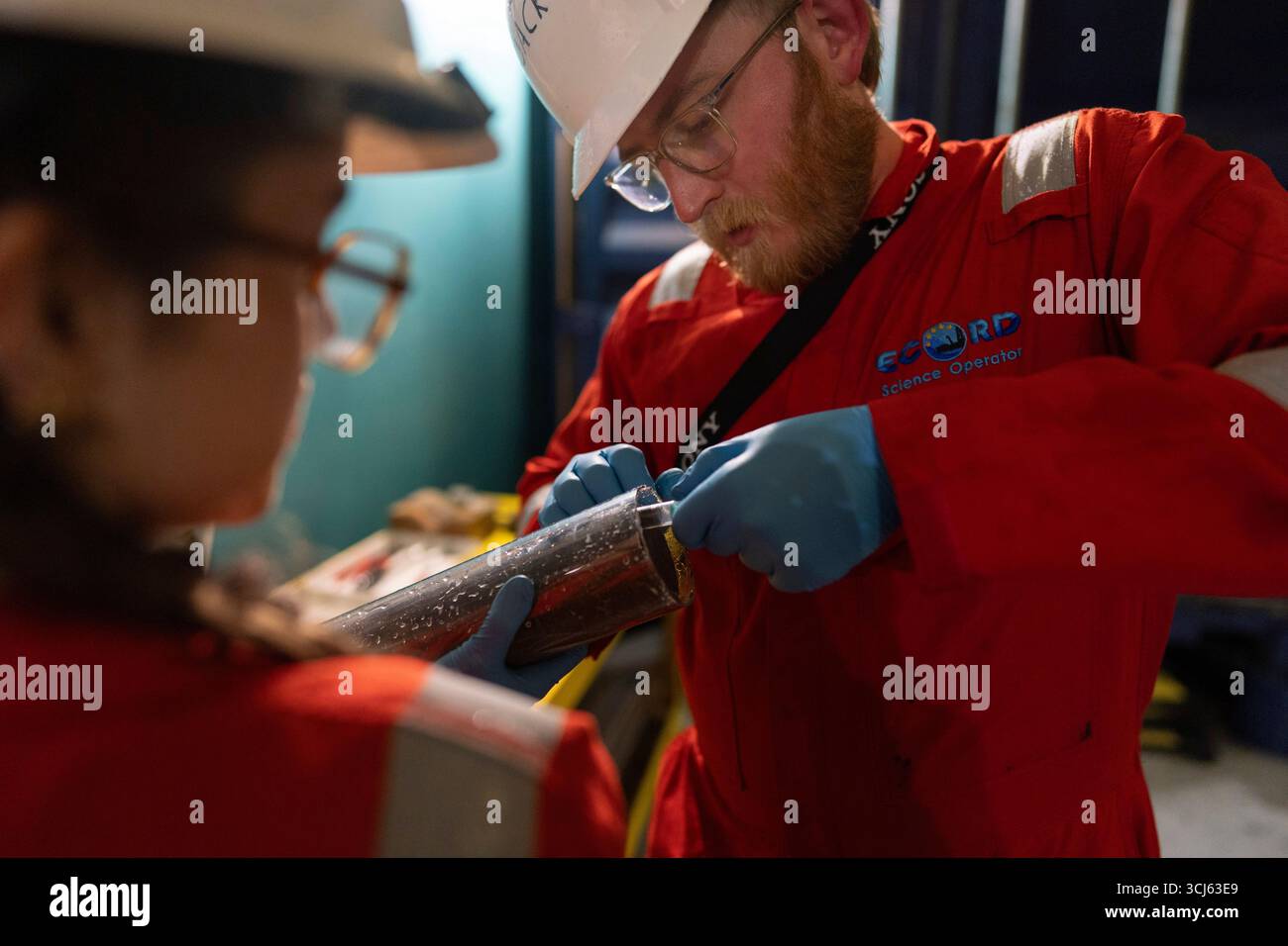Expedition 501 researchers Jack Brickell, right, and Alizé Longeau ...