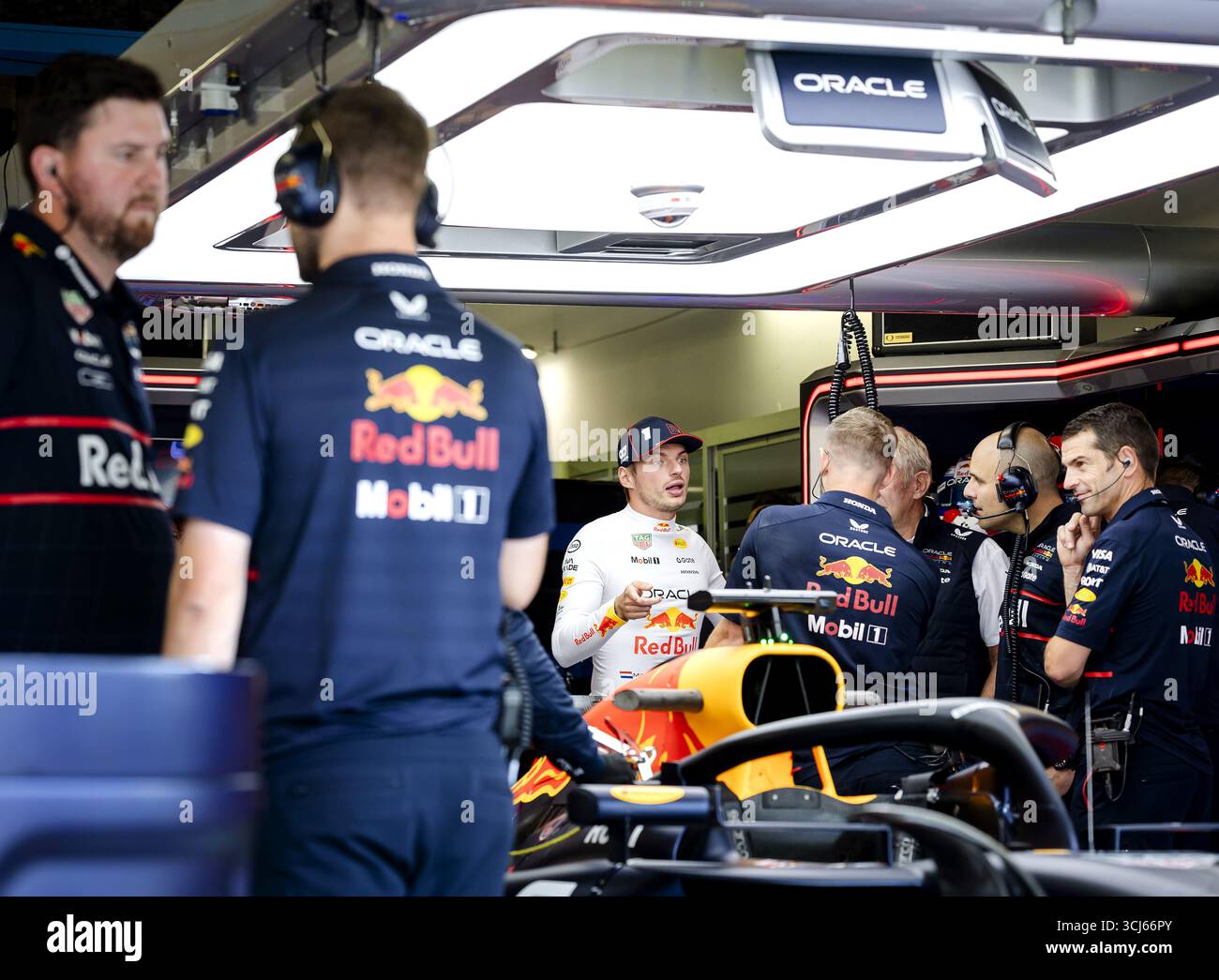 MONZA - Max Verstappen (Red Bull Racing) talks with Helmut Marko (Red Bull Racing) and Gianpiero ...