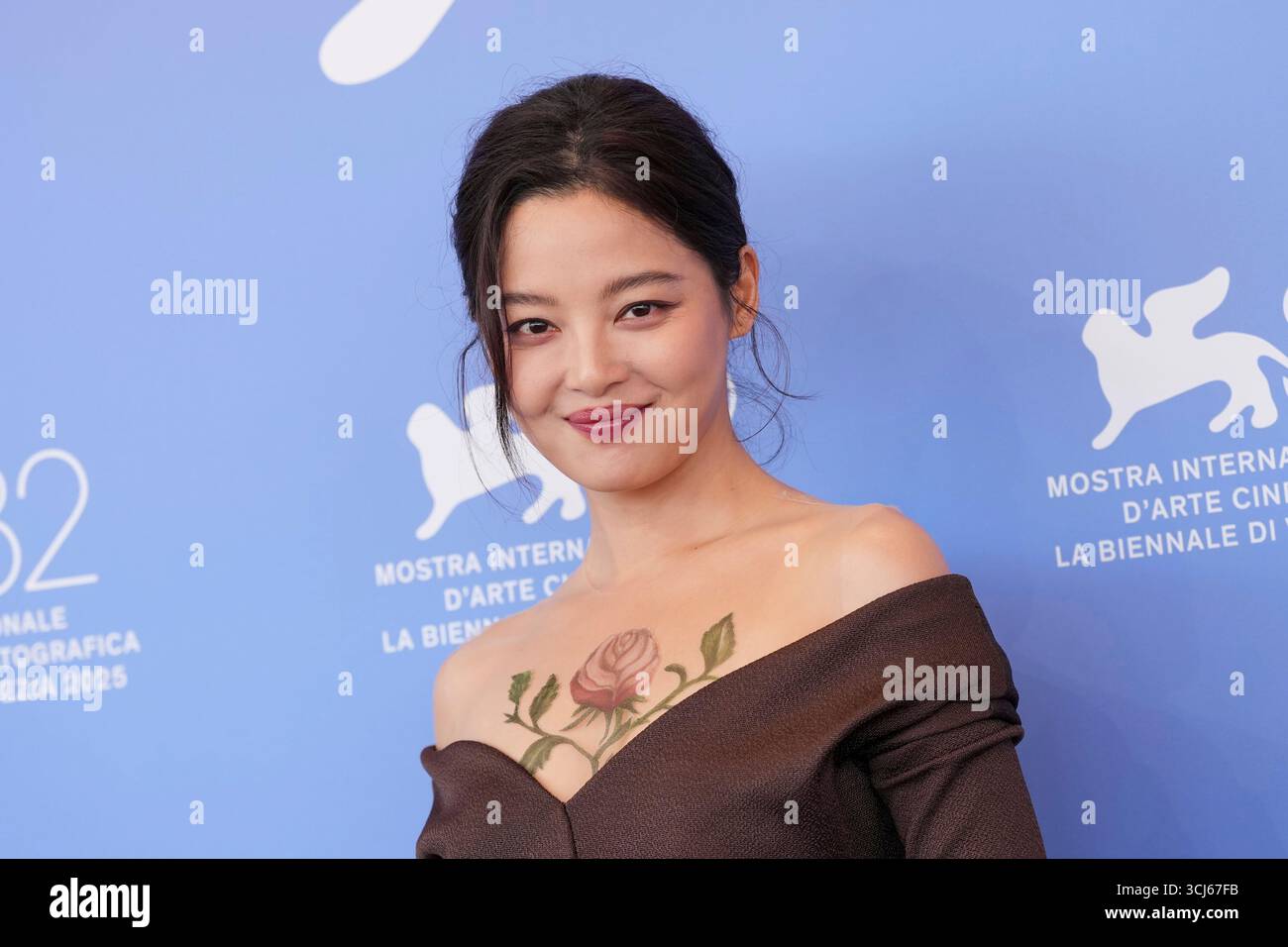 Xin Zhilei poses for photographers at the photo call for the film 'The Sun Rises on Us All ...