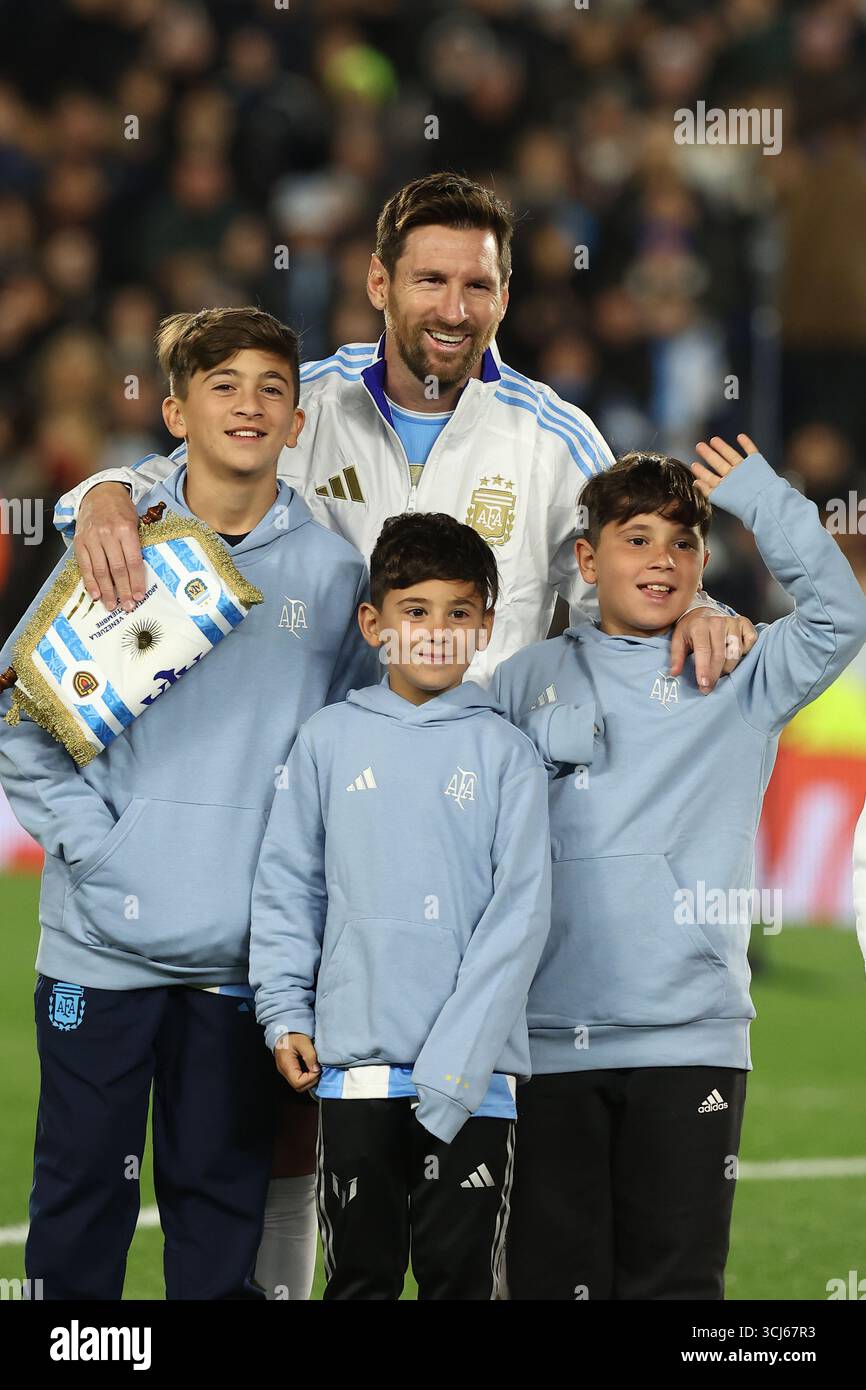 Argentina's forward Lionel Messi (C-back) and his three children (Thiago, Mateo and Ciro ...