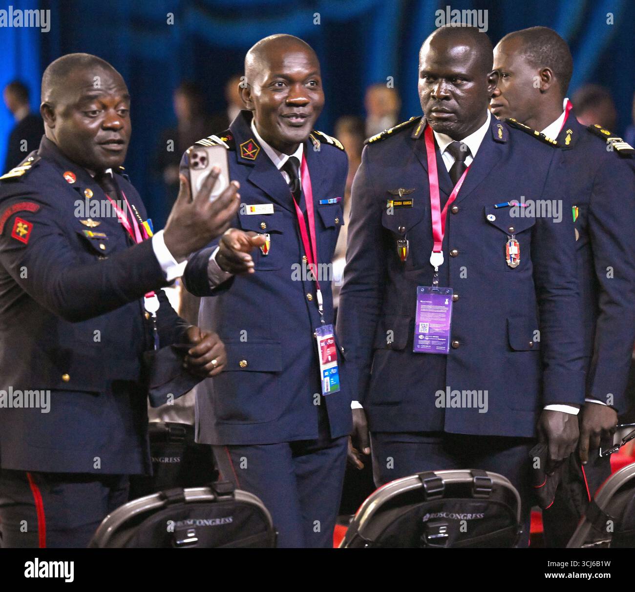 Foreign military personnel before the start of the plenary session ...