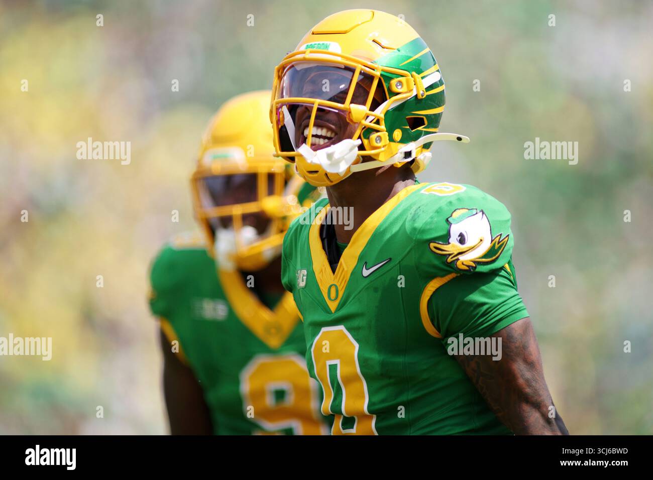 Oregon defensive back Daylen Austin (0) celebrates a referee's call ...