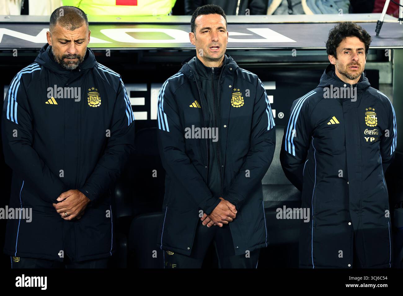 (L to R) Argentina’s head coach Lionel Scaloni (C) and his assistants Walter Samuel (L) and ...