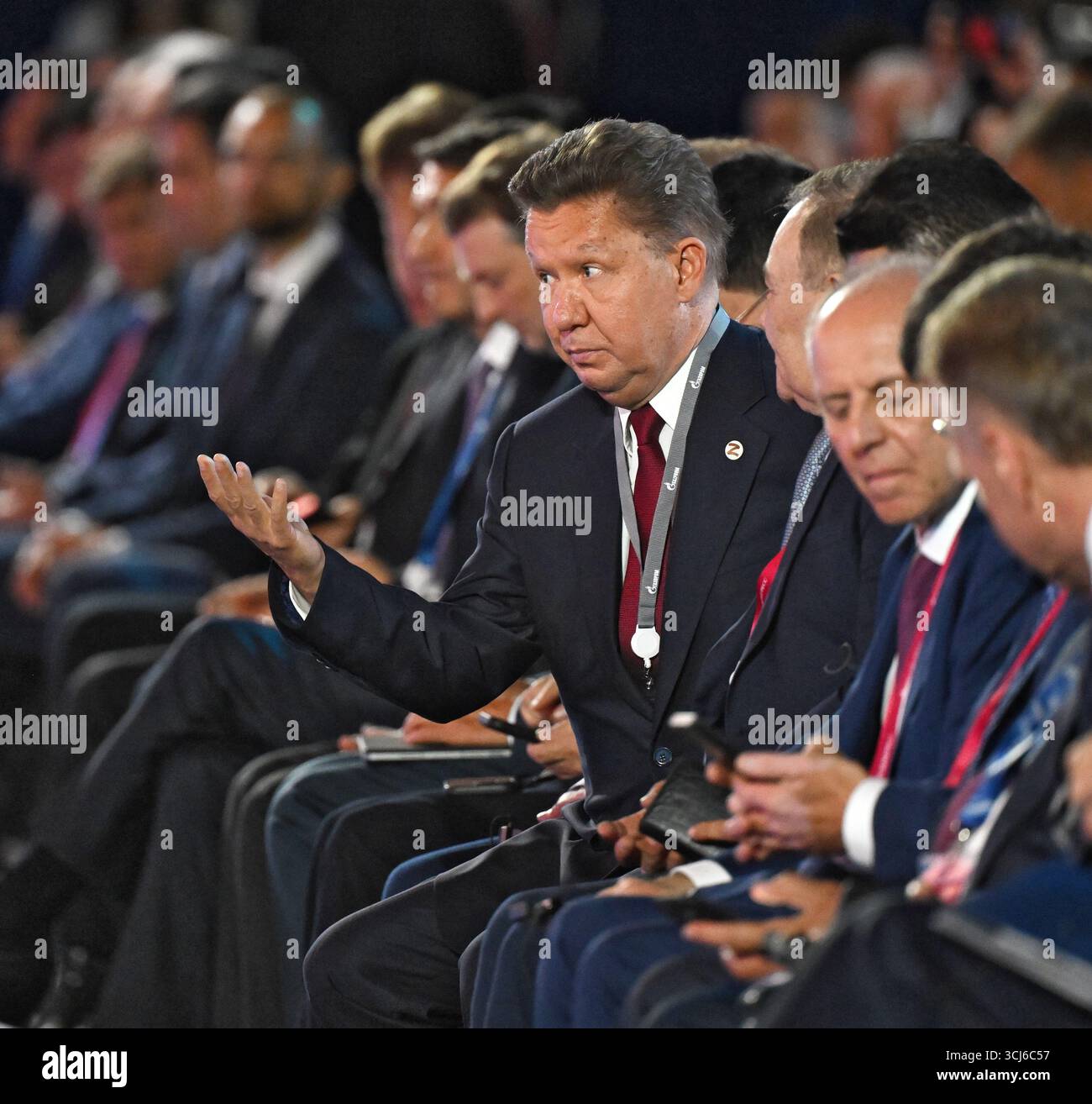 Chairman of the Management Board of Gazprom Alexey Miller (center ...