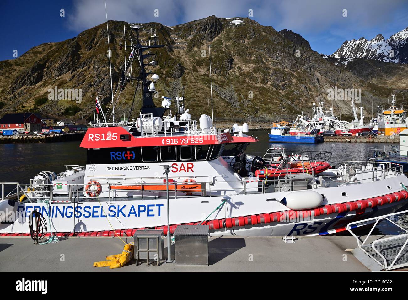 Boats moored in Ballstad harbour near Leknes on the Lofoten Islands ...