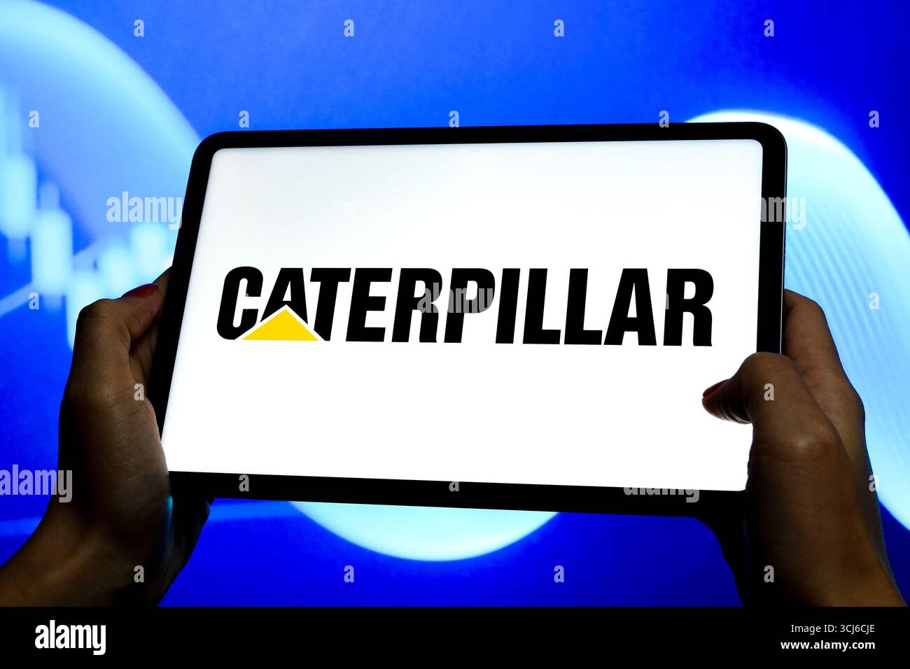 In this photo illustration, the logo of Caterpillar Inc. is displayed ...