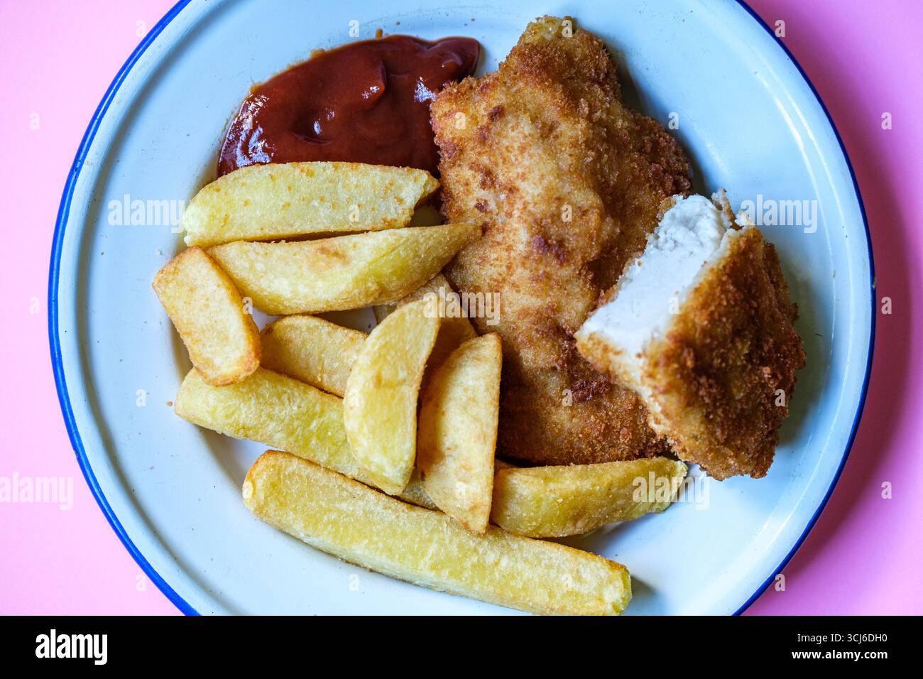 London UK, September 05 2025, Breaded Chicken Fillets With Chuncy Chips ...