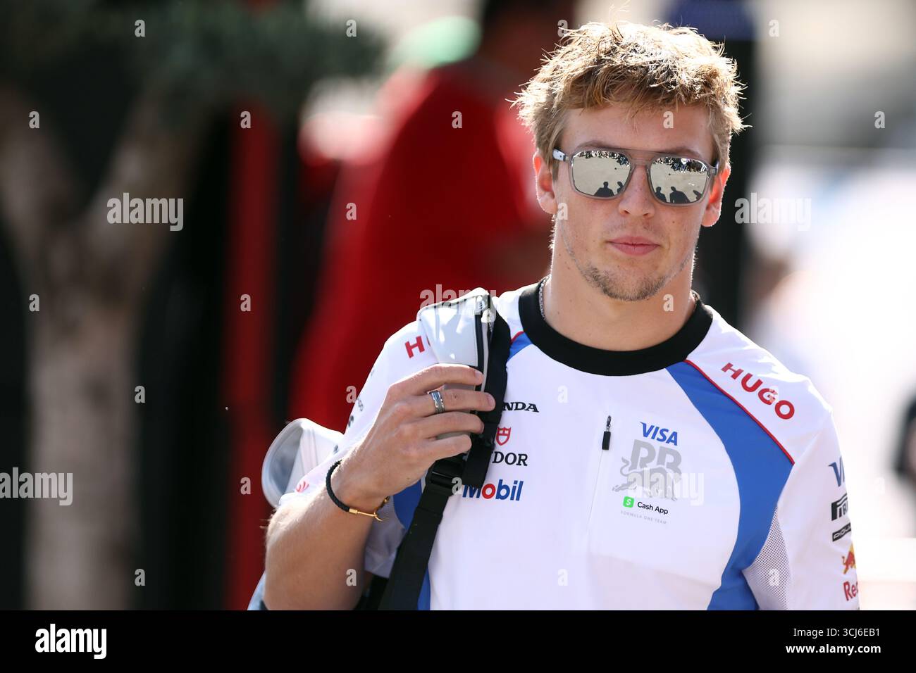 Liam Lawson of Racing Bulls Formula One Team looks on in the Paddock ...