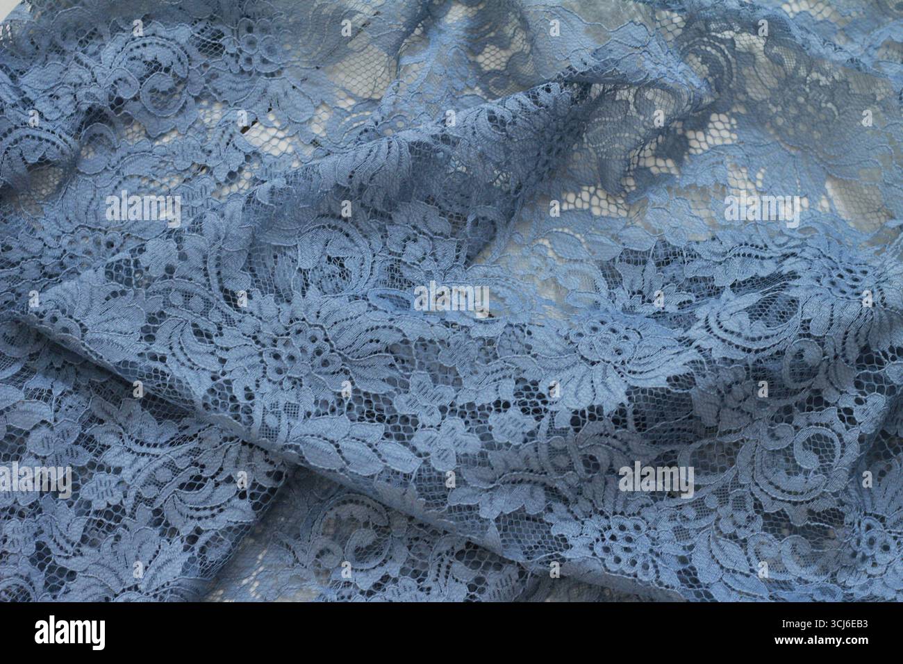 Blue silk brocade hi-res stock photography and images - Alamy
