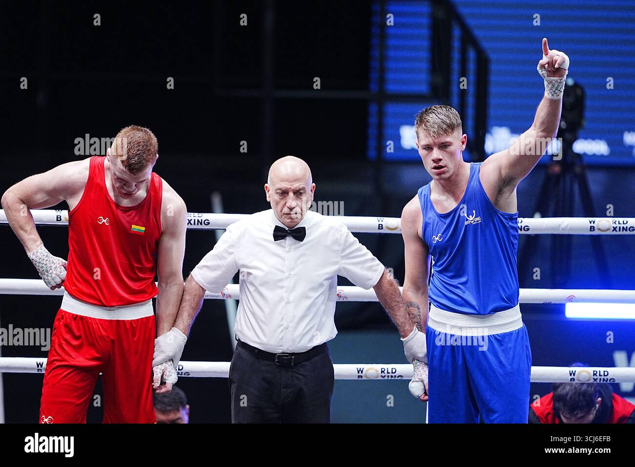 Robert McNulty (right) celebrates winning their bout against Darius ...