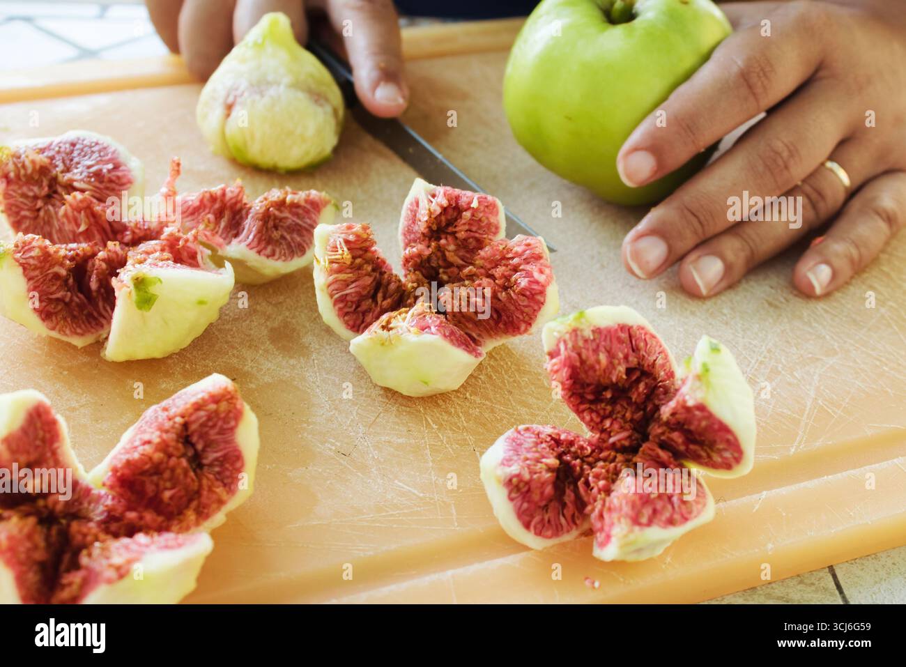 Close up person cutting peeled hi-res stock photography and images - Alamy