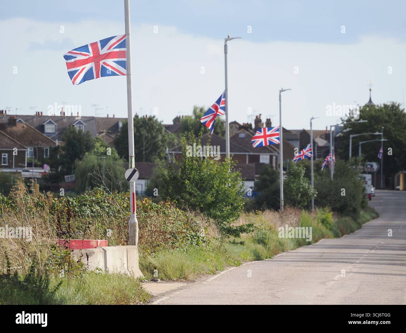 Queenborough, Kent, UK. 5th Sep, 2025. A row of Union flags have ...