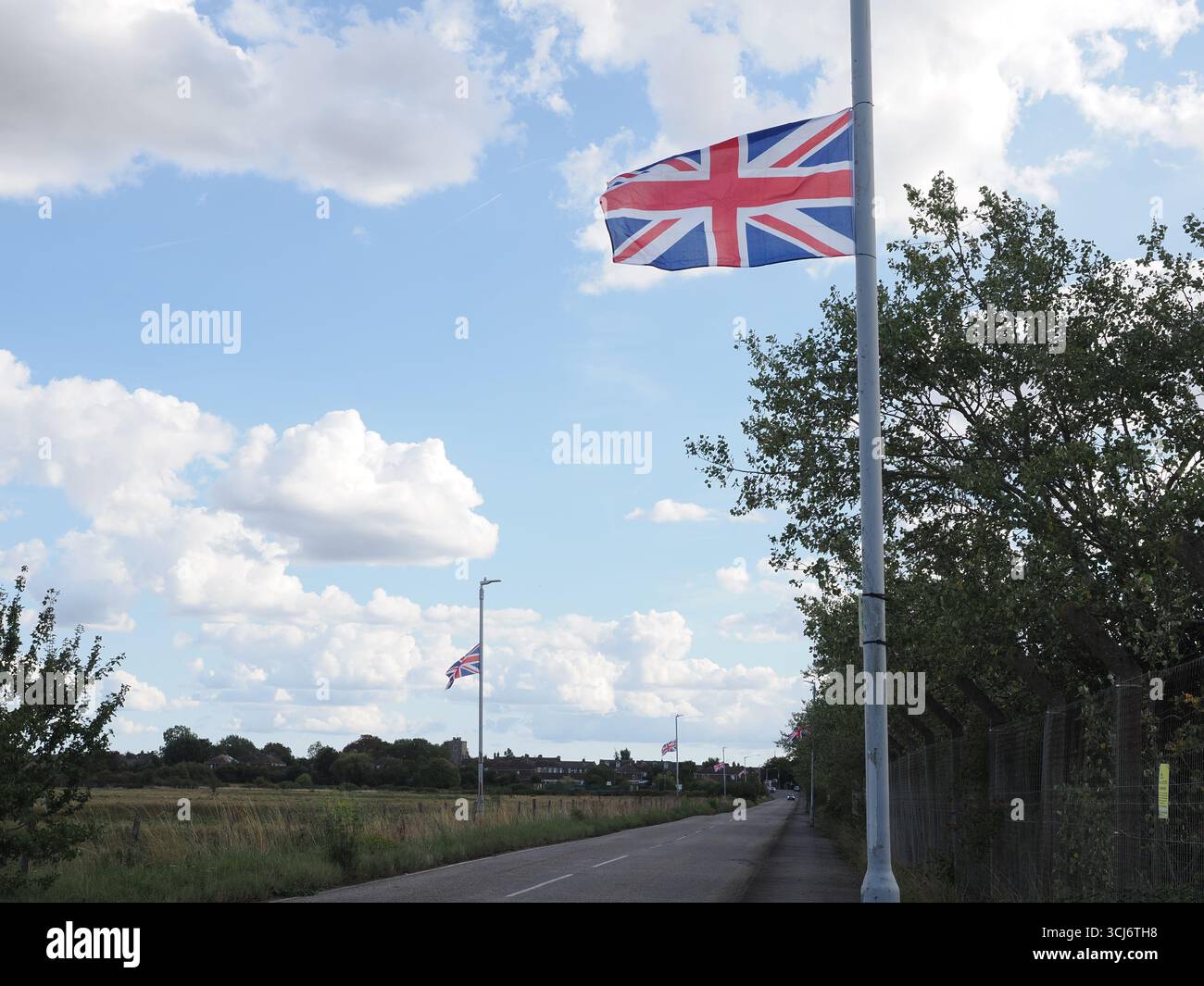 Queenborough, Kent, UK. 5th Sep, 2025. A row of Union flags have ...