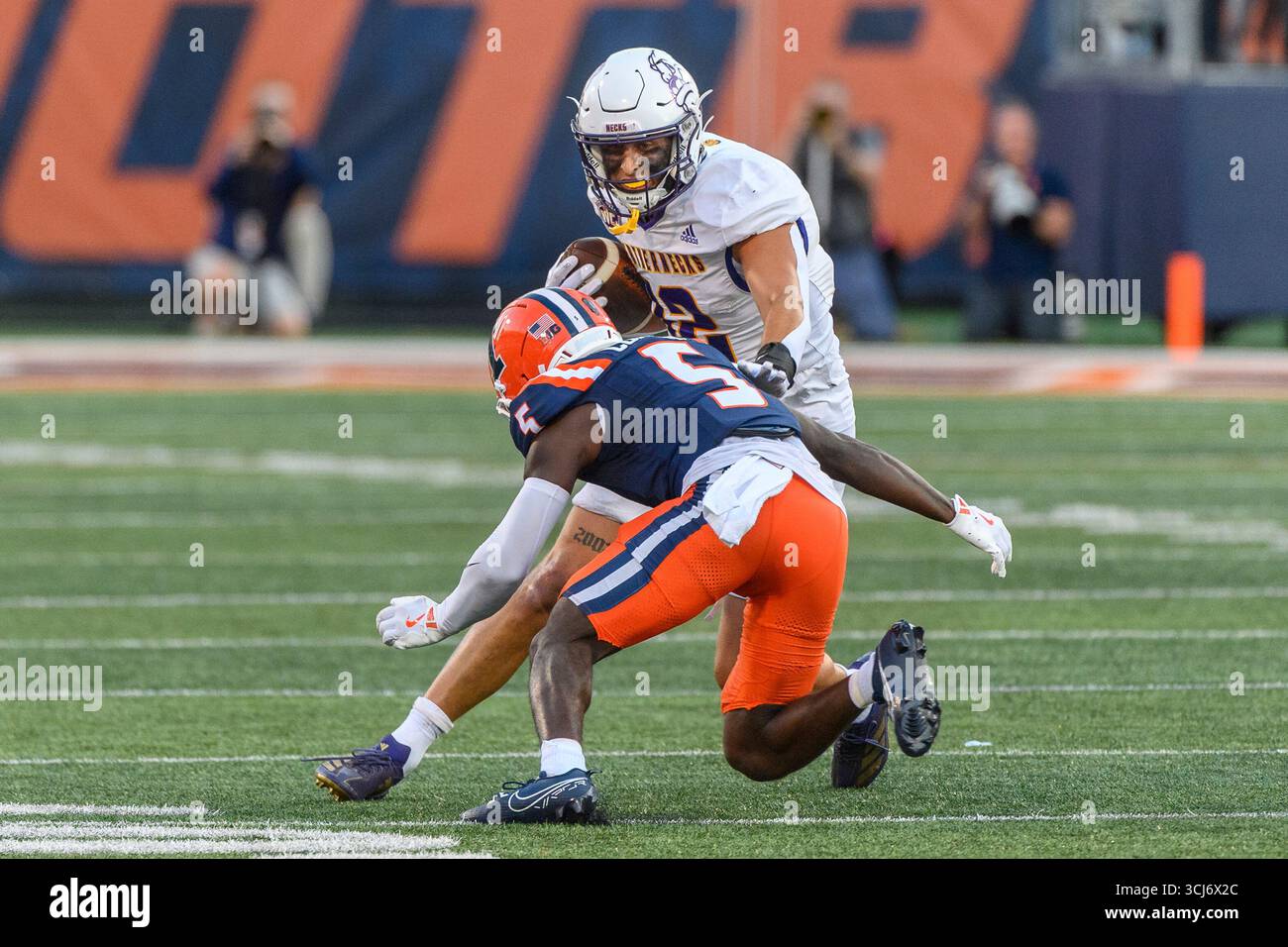 Western Illinois tight end Alex Williams is tackled by Illinois ...
