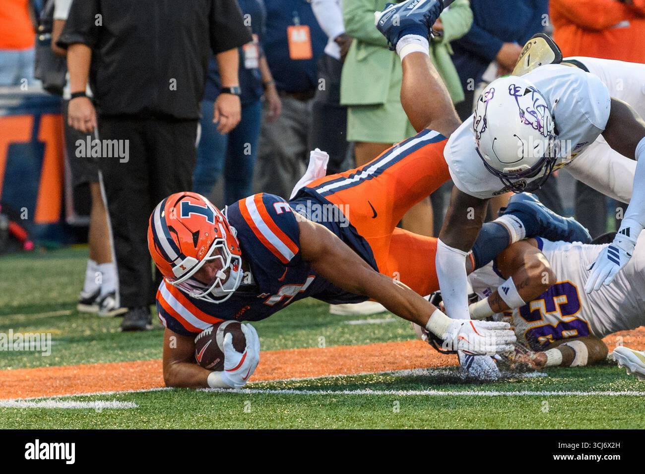 Illinois running back Kaden Feagin (3) reaches for extra yards during ...
