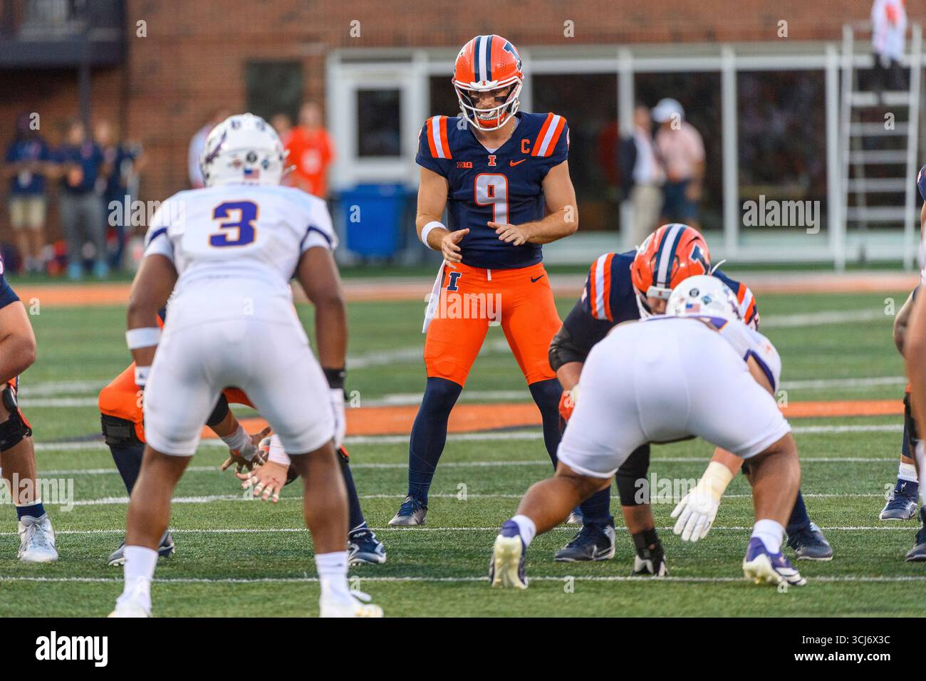 Illinois quarterback Luke Altmyer is set to receive the ball during an ...