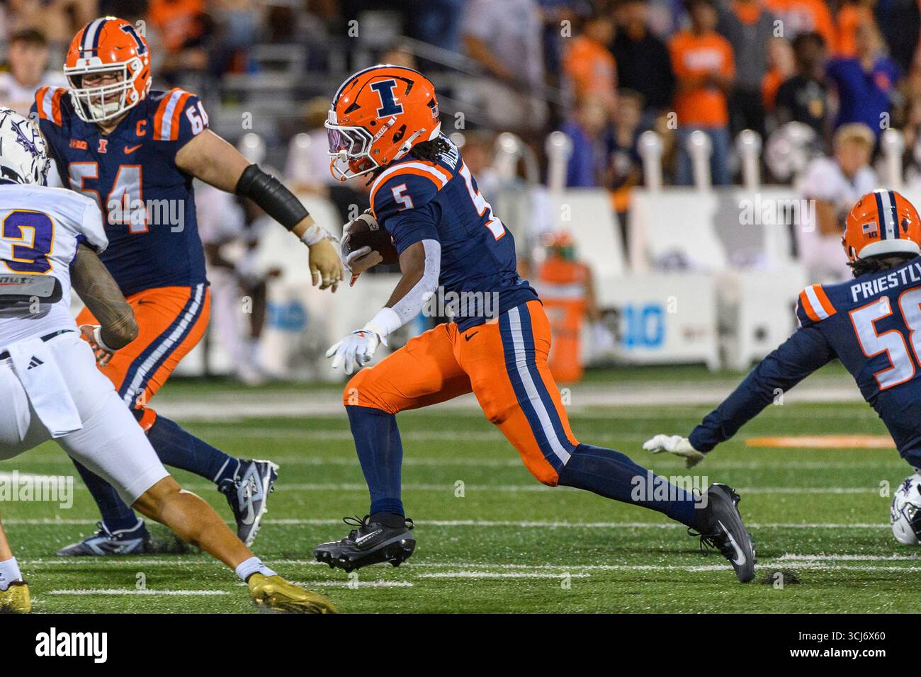 Illinois running back Ca'Lil Valentine (5) rushes during the second ...