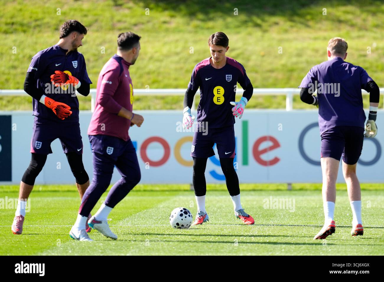 England goalkeeper Ted Curd (centre right) during a training session at ...